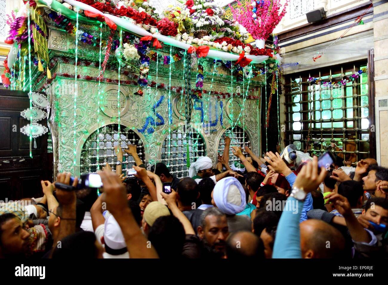 Cairo, Egypt. 12th May, 2015. Muslims pray at the shrine of Syeda ...