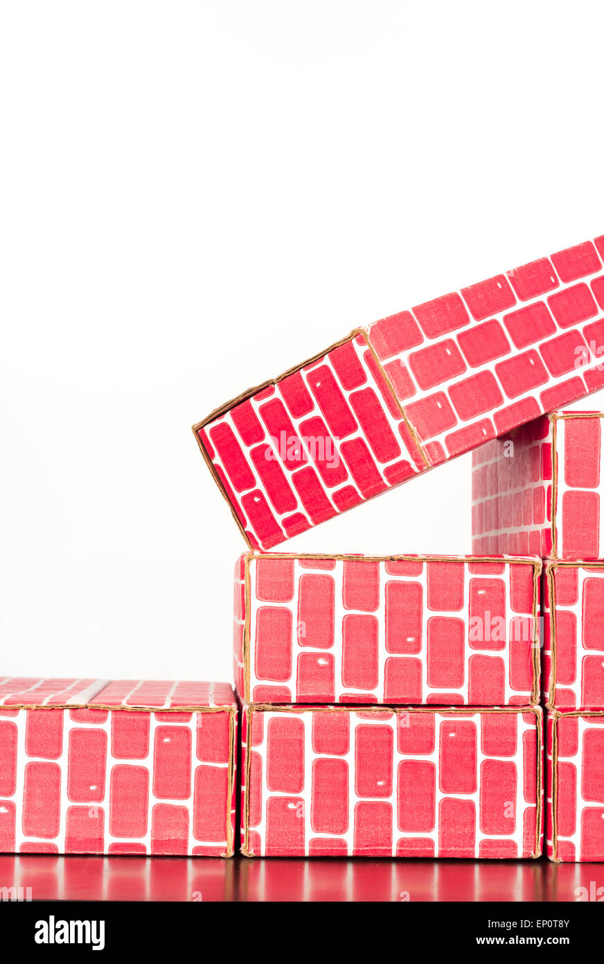 Cardboard brick column graph showing steady growth Stock Photo - Alamy