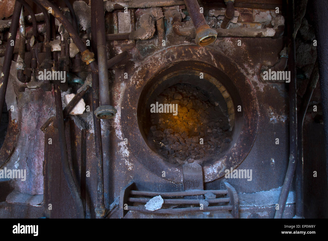 Coal inside blast furnace in abandoned steel complex Stock Photo - Alamy