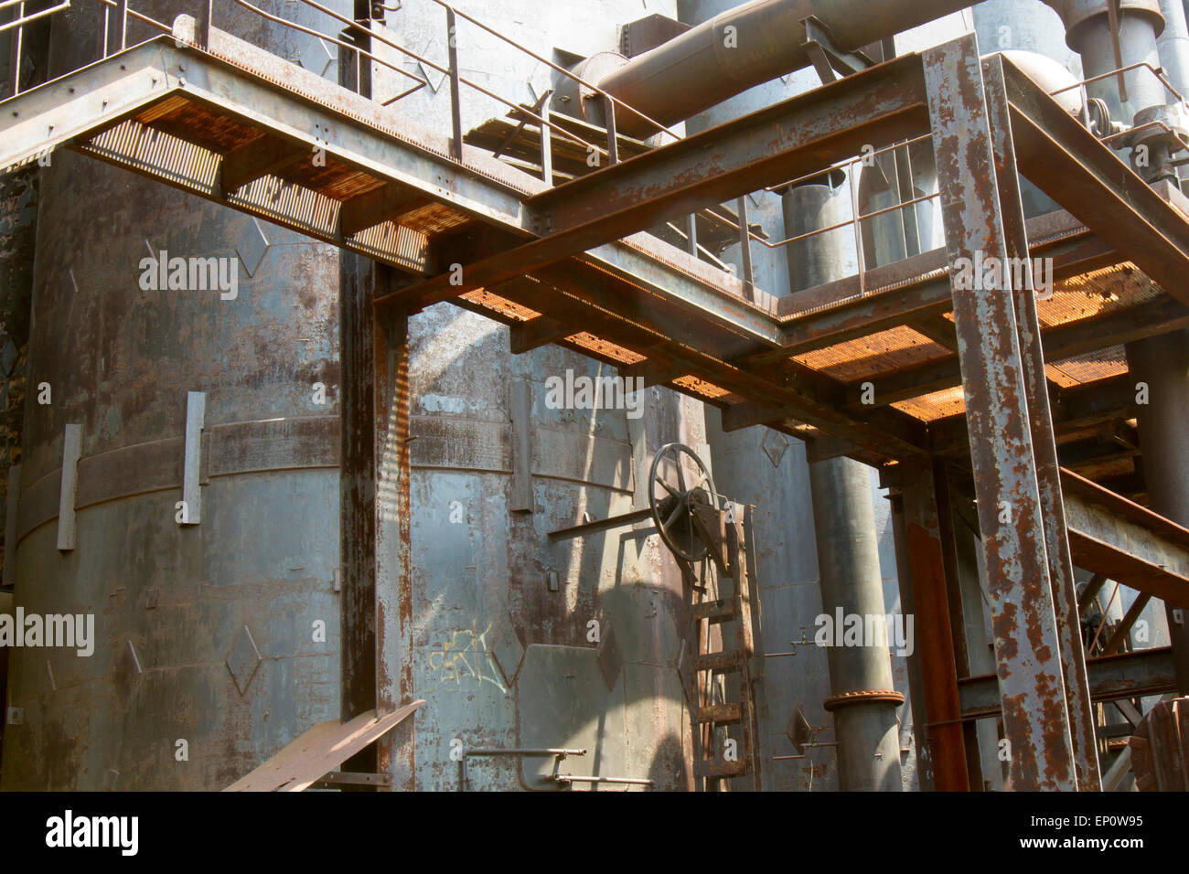 Rusting industrial tanks in abandoned factory Stock Photo - Alamy