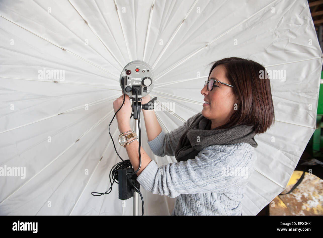 Adjusting the light hi-res stock photography and images - Alamy