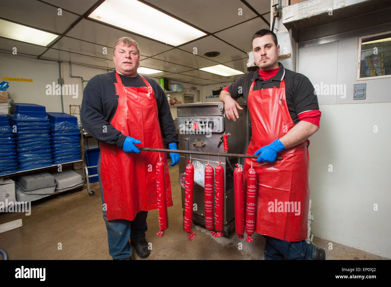 Men with aprons hi-res stock photography and images - Alamy