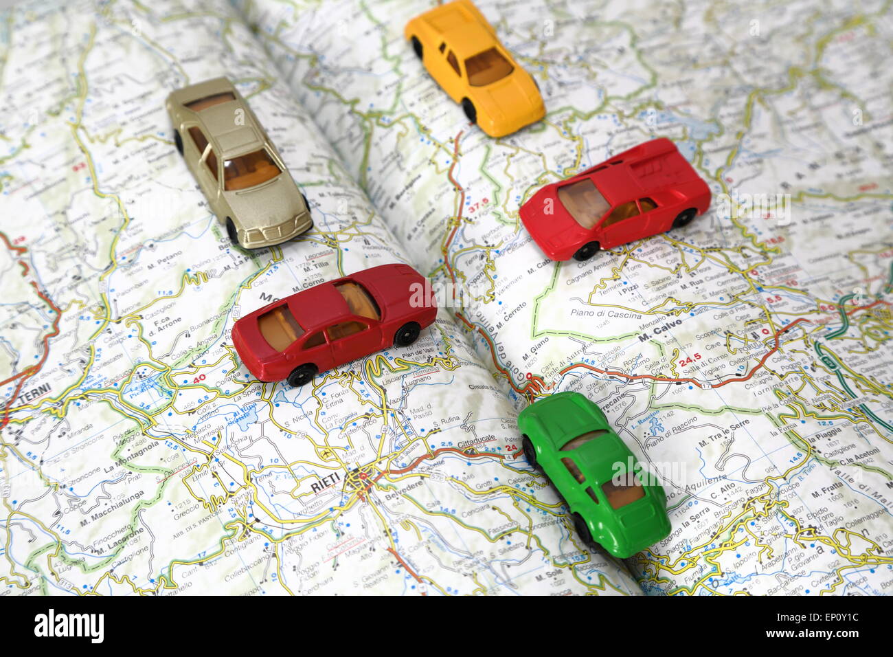 Cars on a road map Stock Photo - Alamy