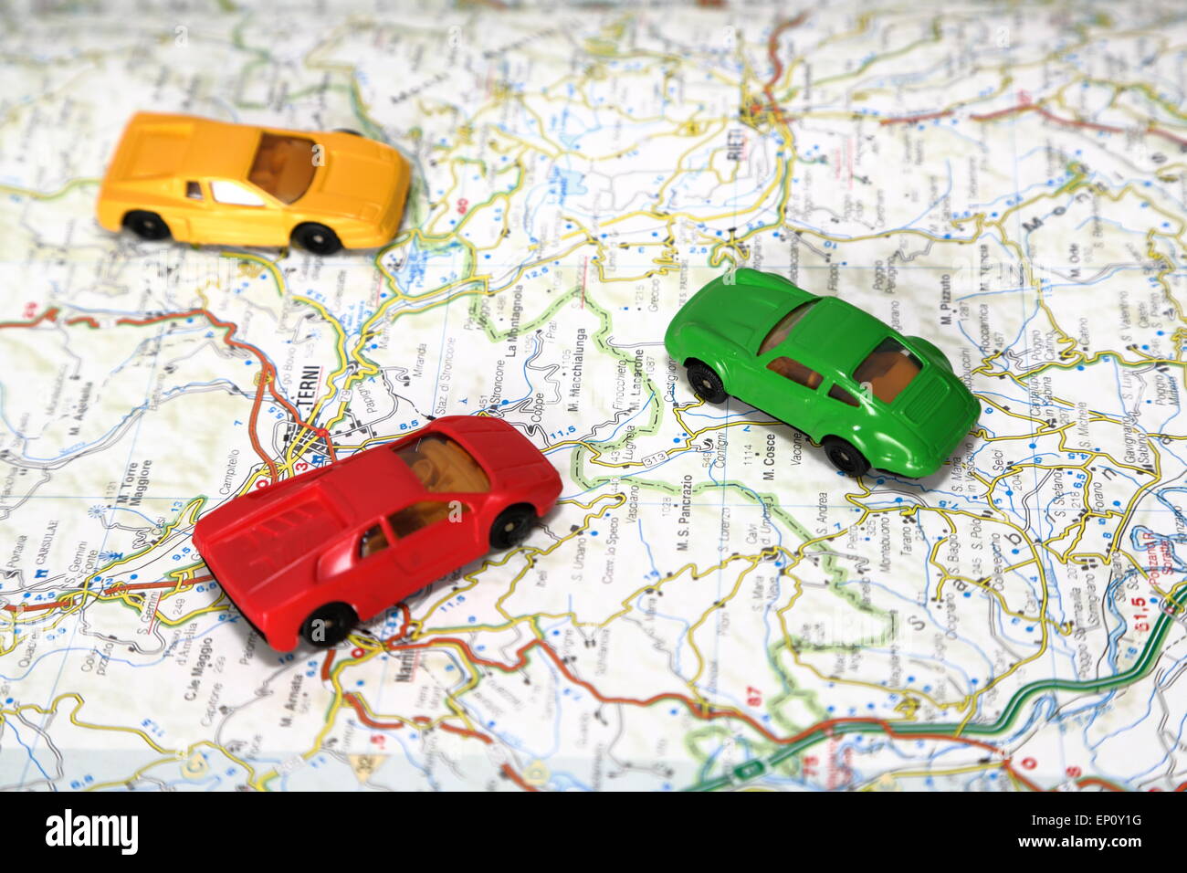 Cars on a road map Stock Photo - Alamy