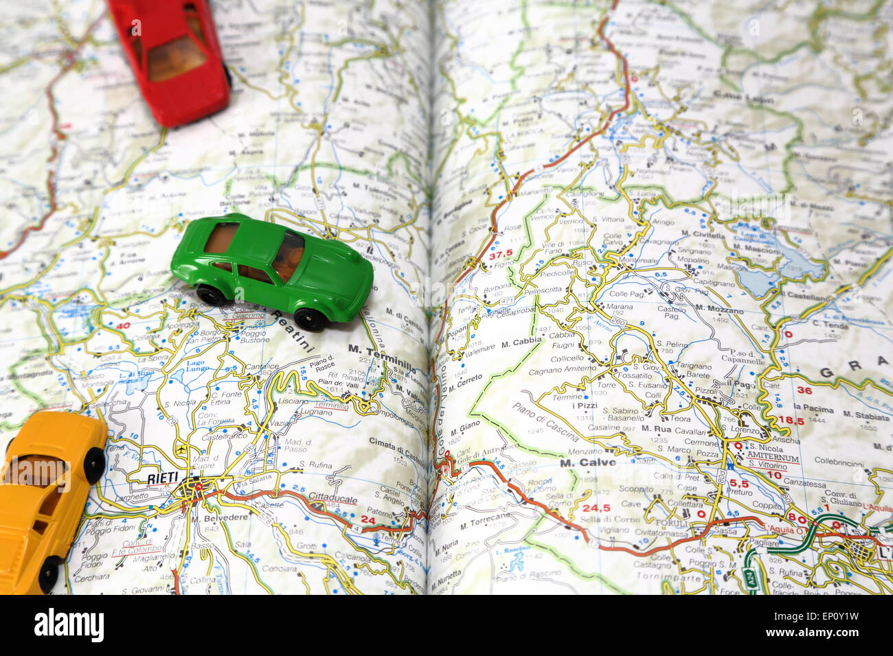 Cars on a road map Stock Photo - Alamy