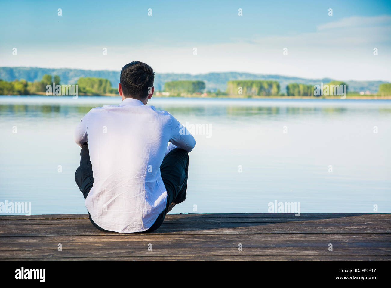 One handsome man meditating hi-res stock photography and images - Alamy