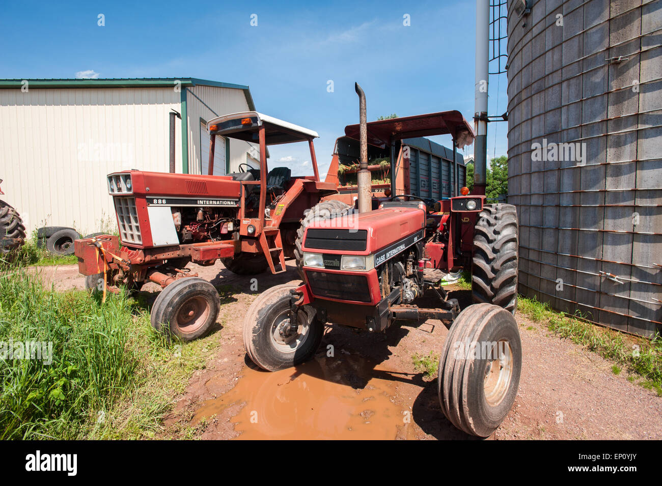 Two red tractors on farm in Honesdale, PA Stock Photo - Alamy