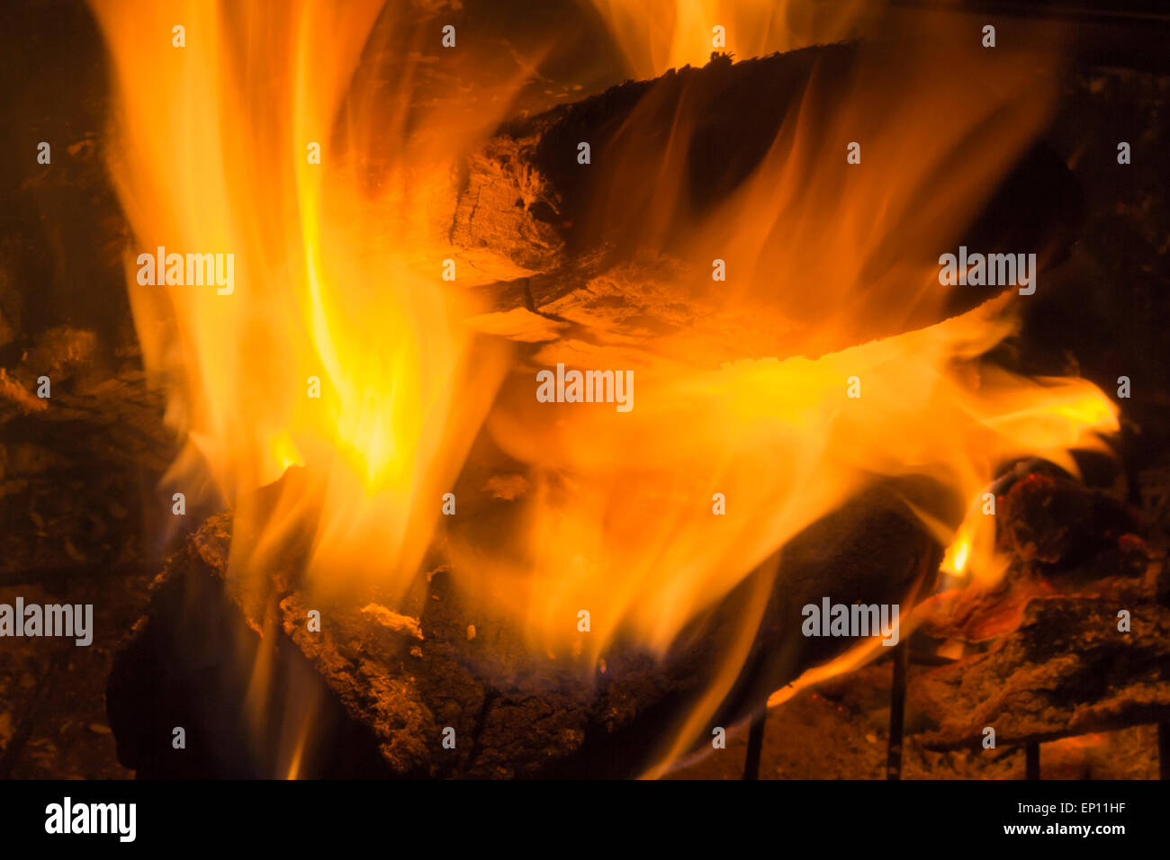 Outdoor camp fire fire pit ablaze for summer vacation background Stock ...