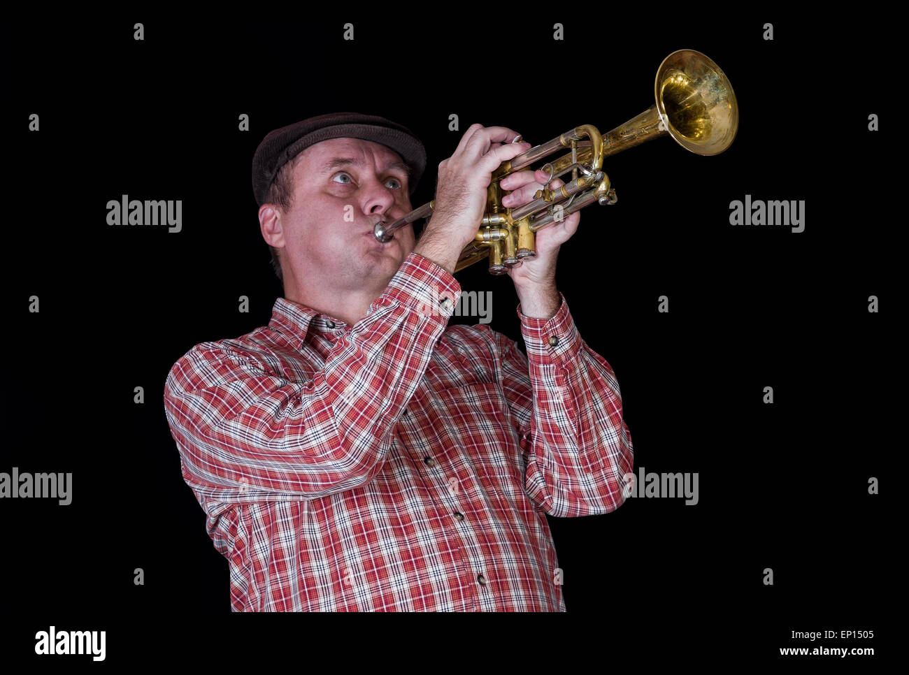 Portrait of mature trumpeter playing the instrument Stock Photo - Alamy