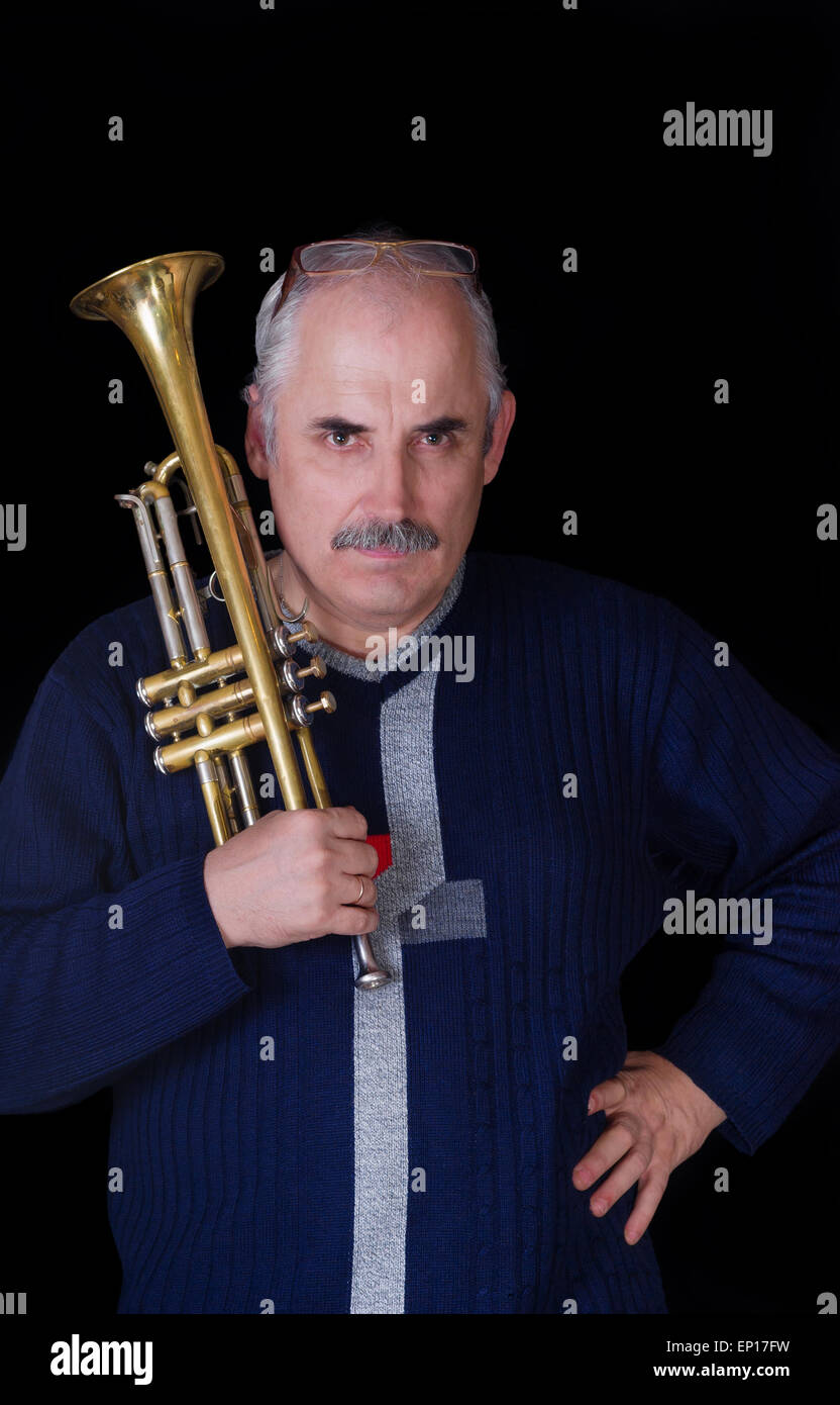 Portrait of trumpeter meditating on musical composition Stock Photo - Alamy