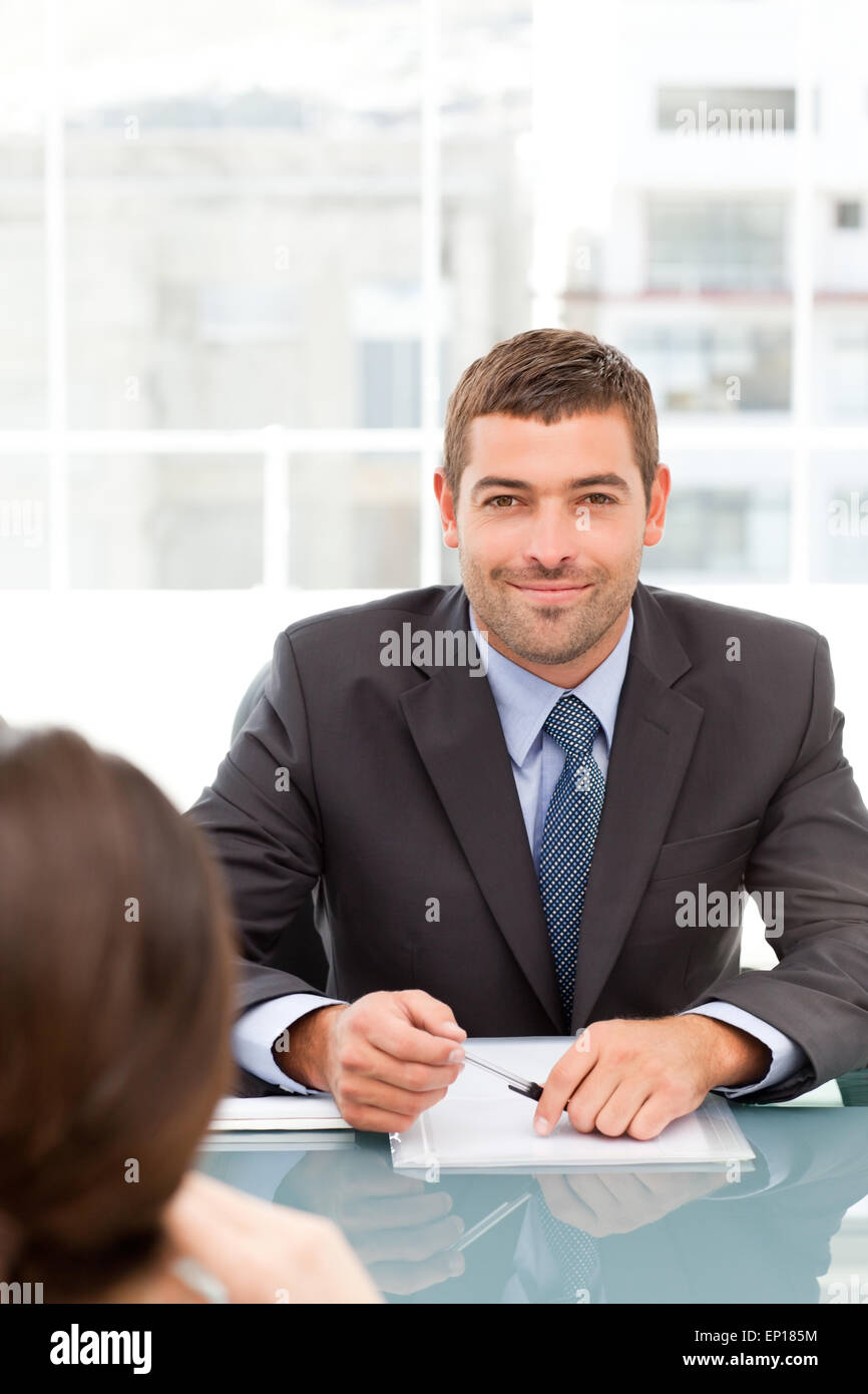 Happy businessman during an interview with a female colleague Stock ...