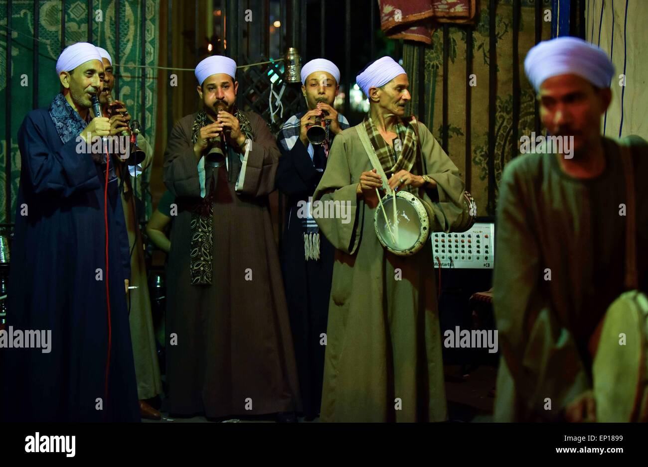 Jan. 26, 2014 - Cairo, Cairo, Egypt - Egyptians dance to the music of a ...