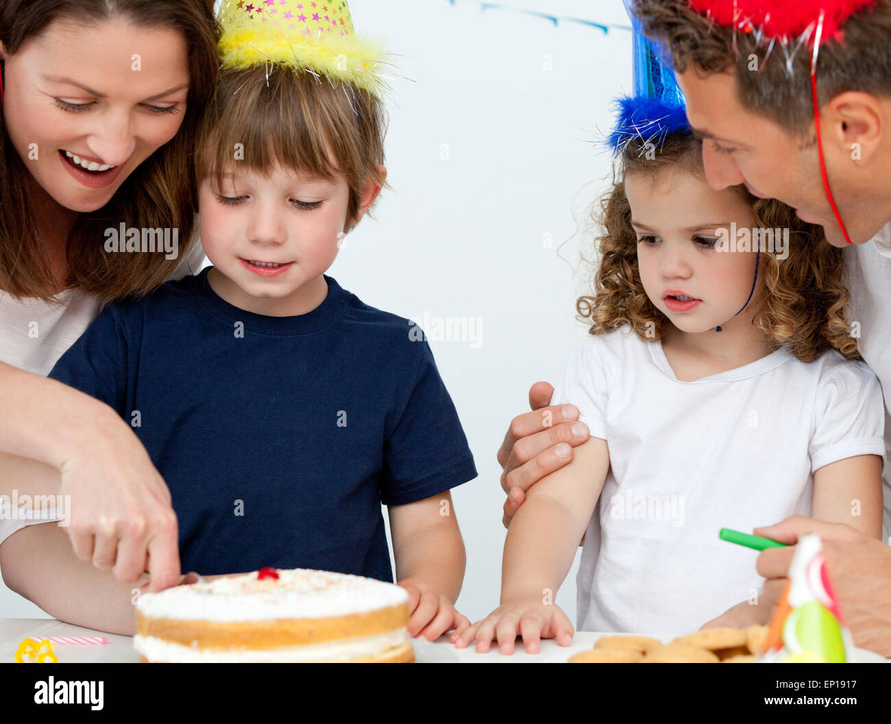 Father son cutting birthday cake hi-res stock photography and images ...
