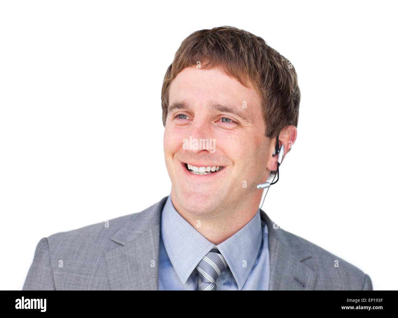 Attractive customer service agent with headset on against a white ...