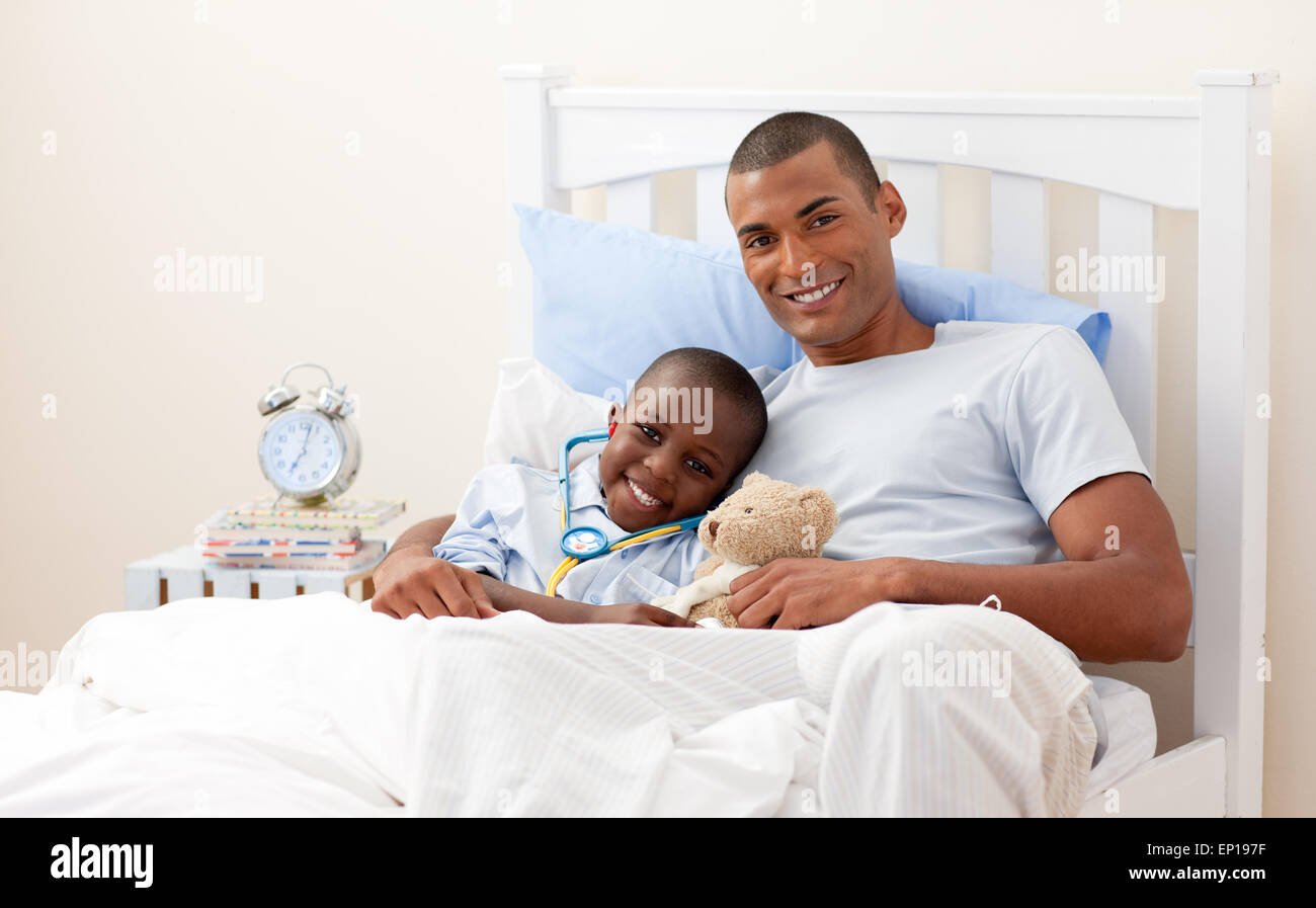 Father with his sick child Stock Photo - Alamy
