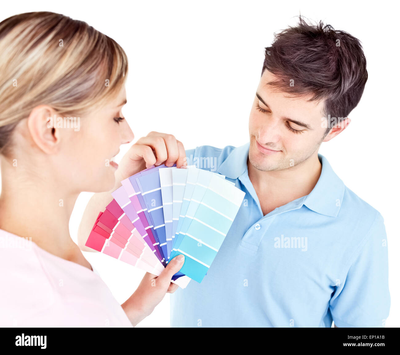 Enamored couple choosing color for a room Stock Photo - Alamy