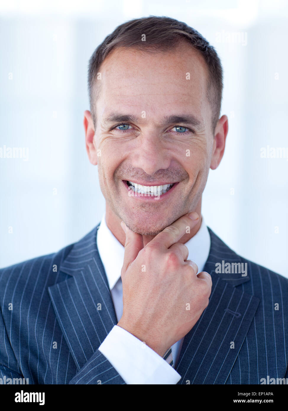 Portrait of a smiling attractive businessman Stock Photo - Alamy