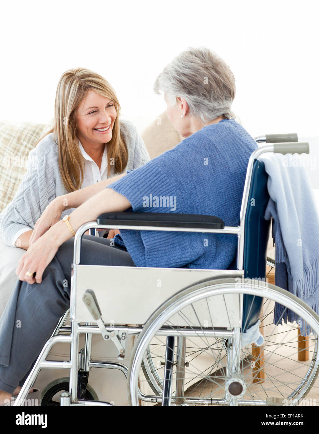 Seniors friends talking together Stock Photo - Alamy