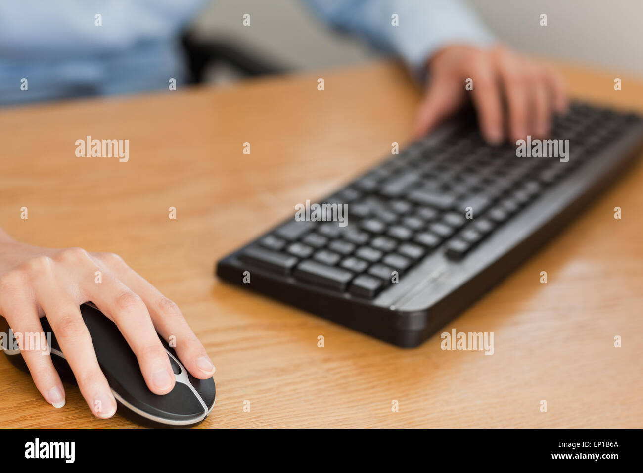 businesswoman with hands on mouse and keyboard Stock Photo - Alamy