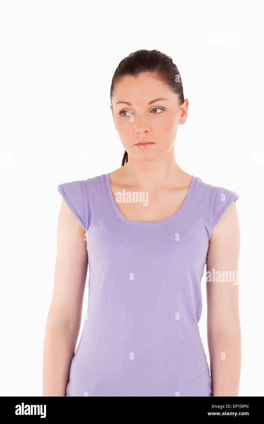 Sad female posing while standing Stock Photo - Alamy