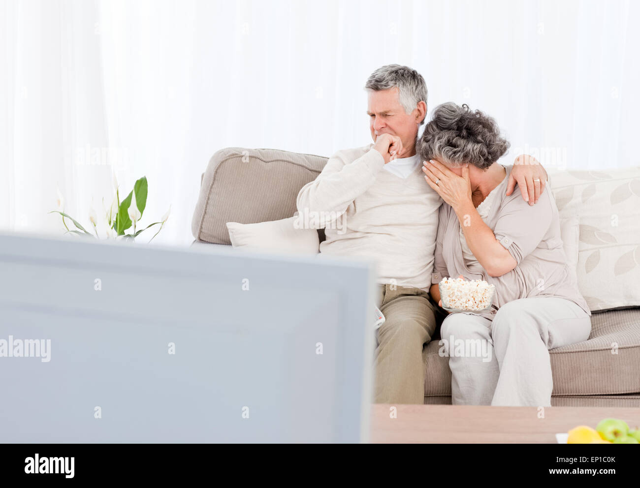 Portrait elderly couple watching tv hi-res stock photography and images ...