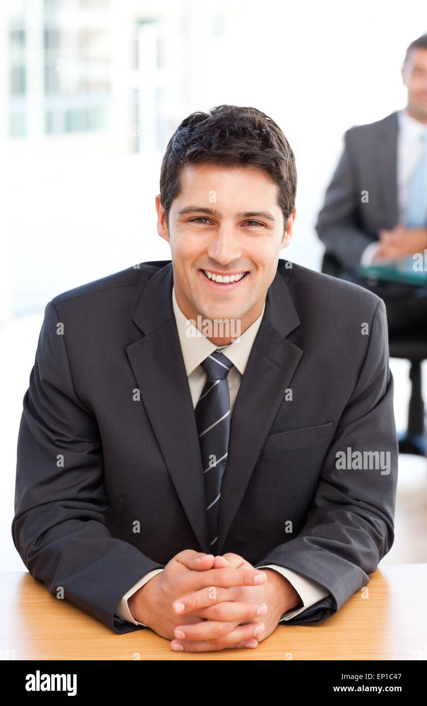 Happy businessman during an interview with a colleague Stock Photo - Alamy
