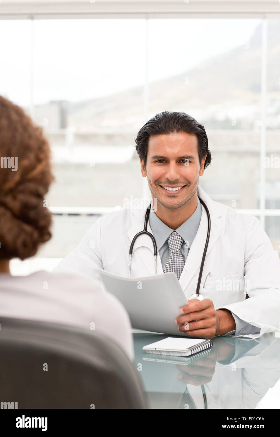 Positive doctor during a appointment with a female patient Stock Photo ...