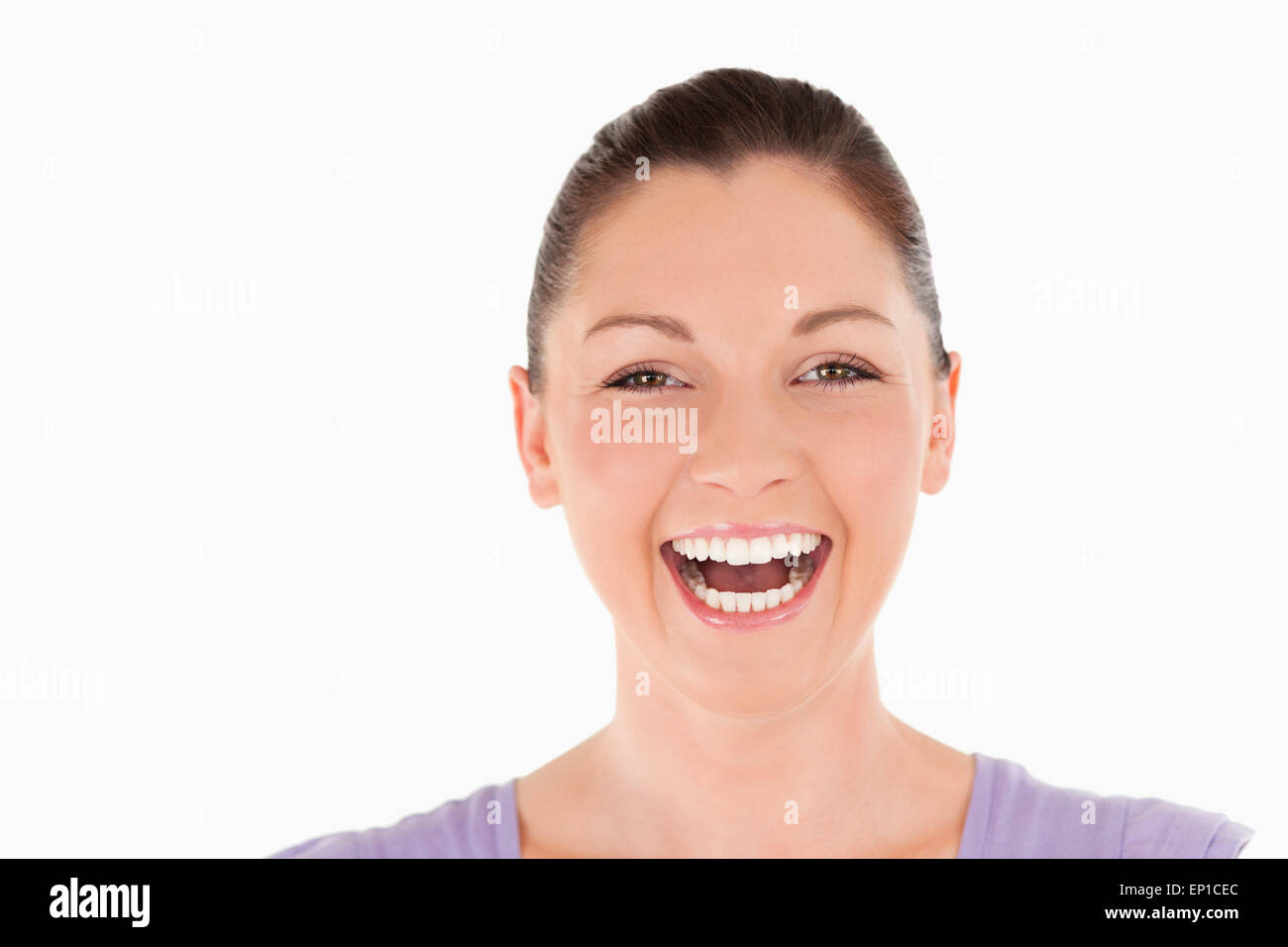 Portrait of a good looking woman posing while standing Stock Photo - Alamy