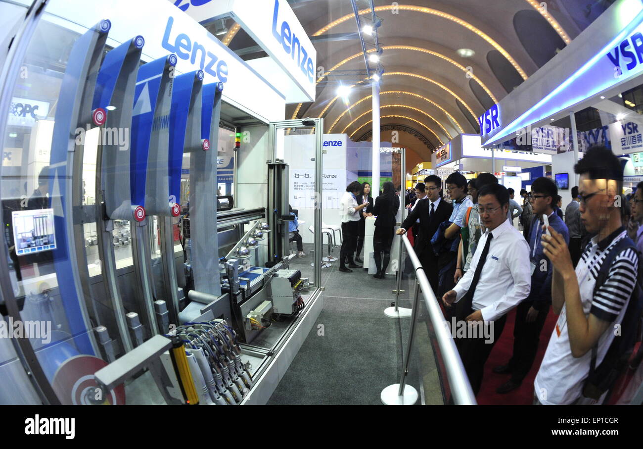 Beijing, China. 13th May, 2015. People watch intelligent industrial ...