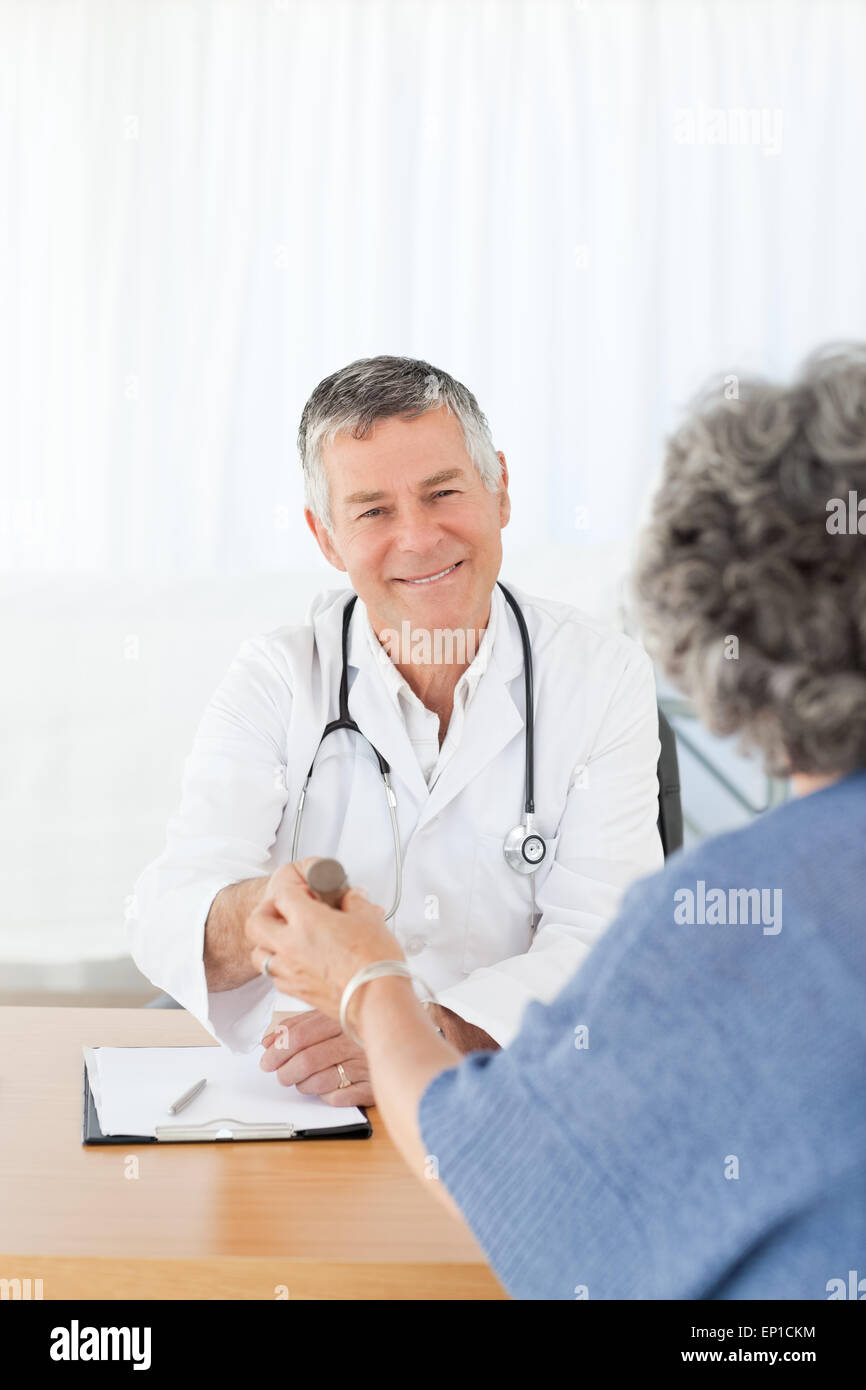 A senior doctor with his patient Stock Photo - Alamy