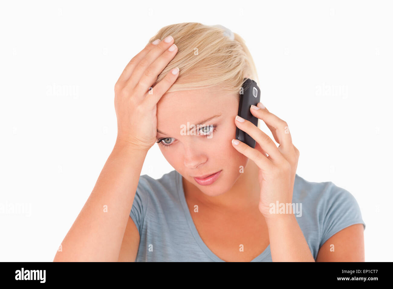 Sad woman on a phone Stock Photo - Alamy
