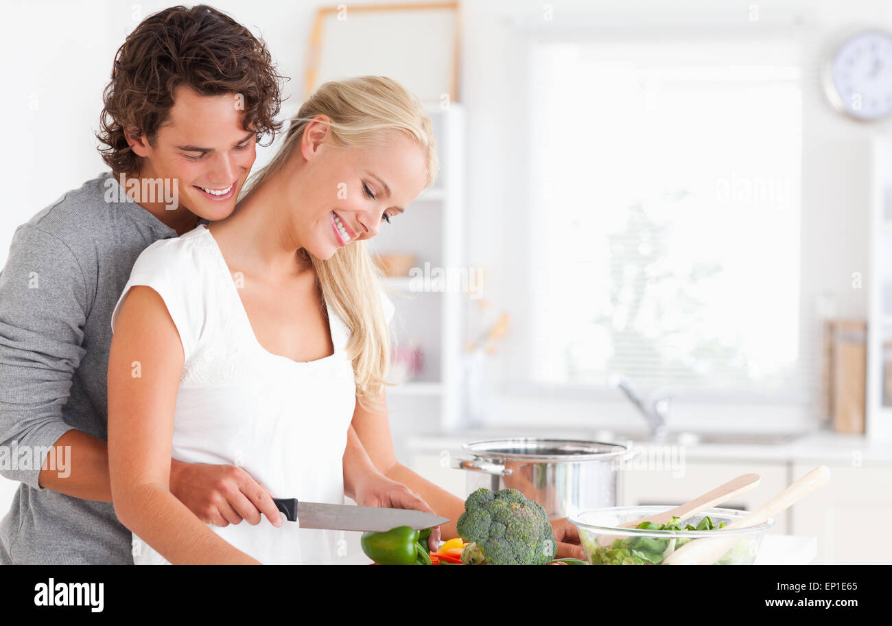 Cute couple cooking Stock Photo - Alamy