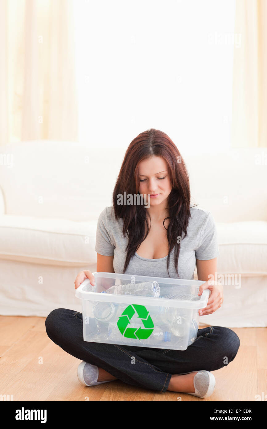 Woman with recycling bin Stock Photo - Alamy