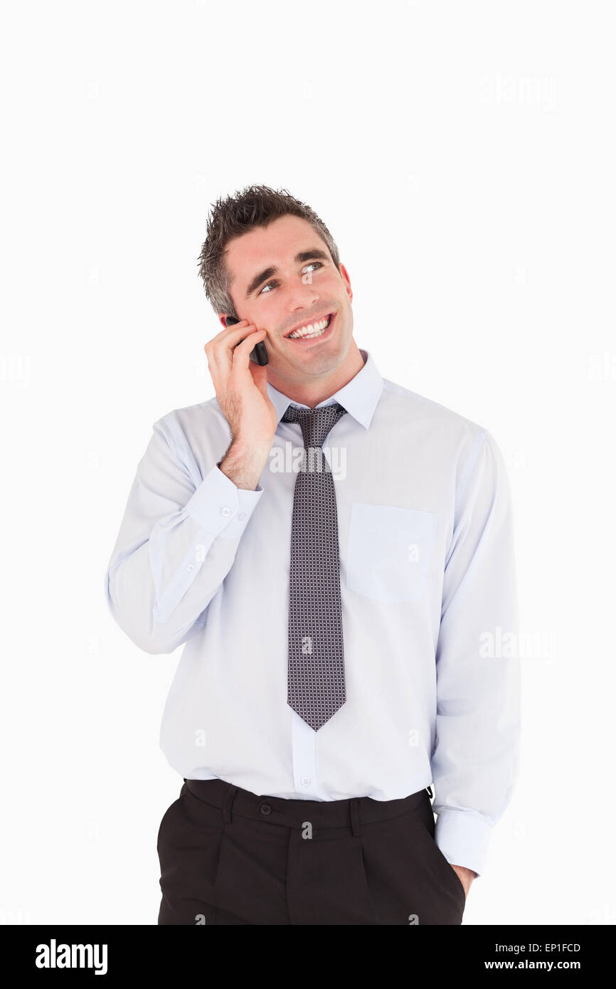 Portrait of a smiling man making a phone call Stock Photo - Alamy