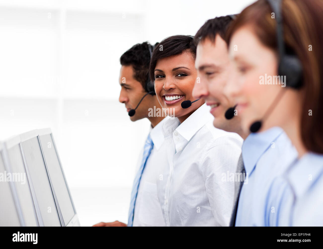 Customer service agents in a call center Stock Photo - Alamy