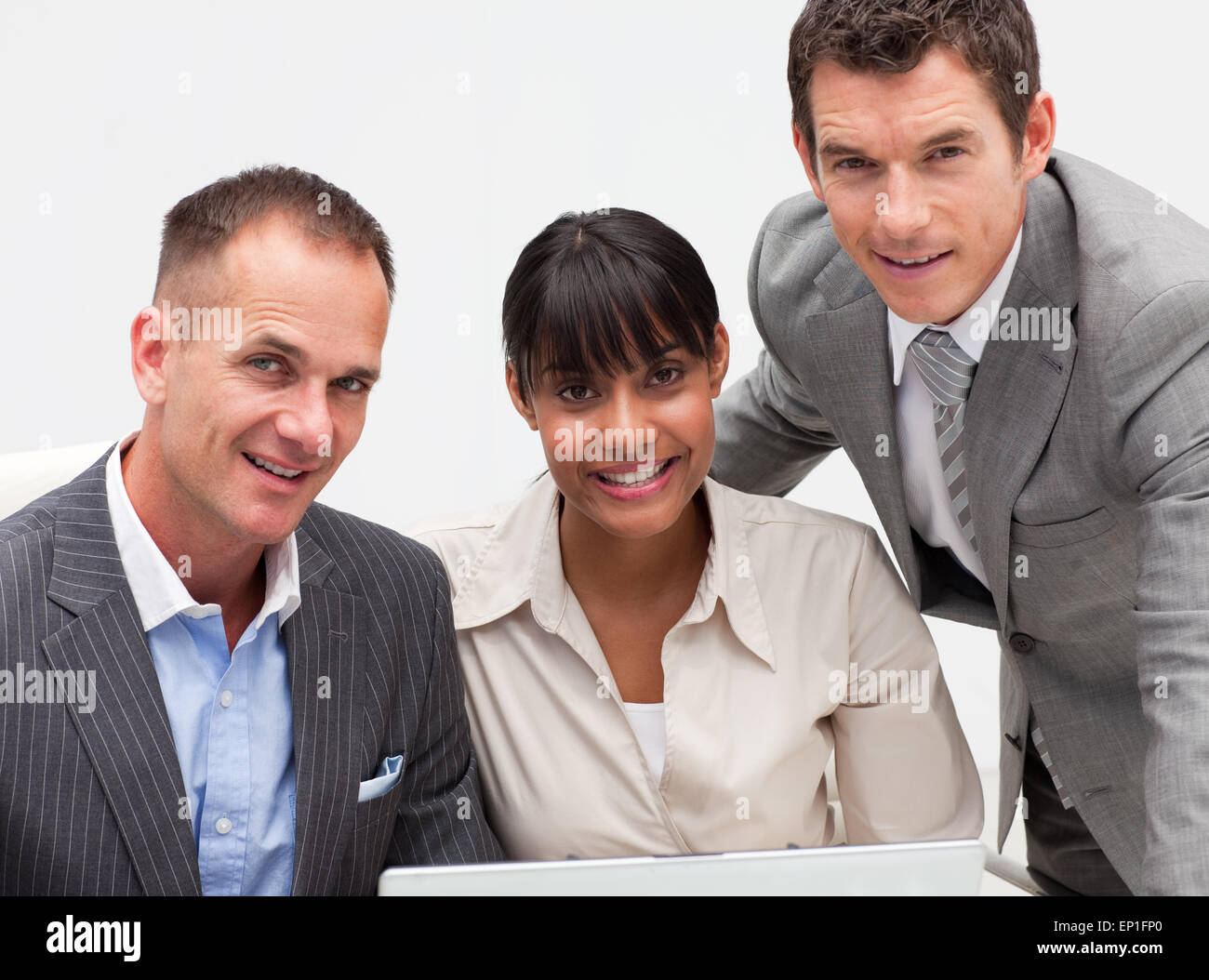 Business team working together with a computer Stock Photo - Alamy