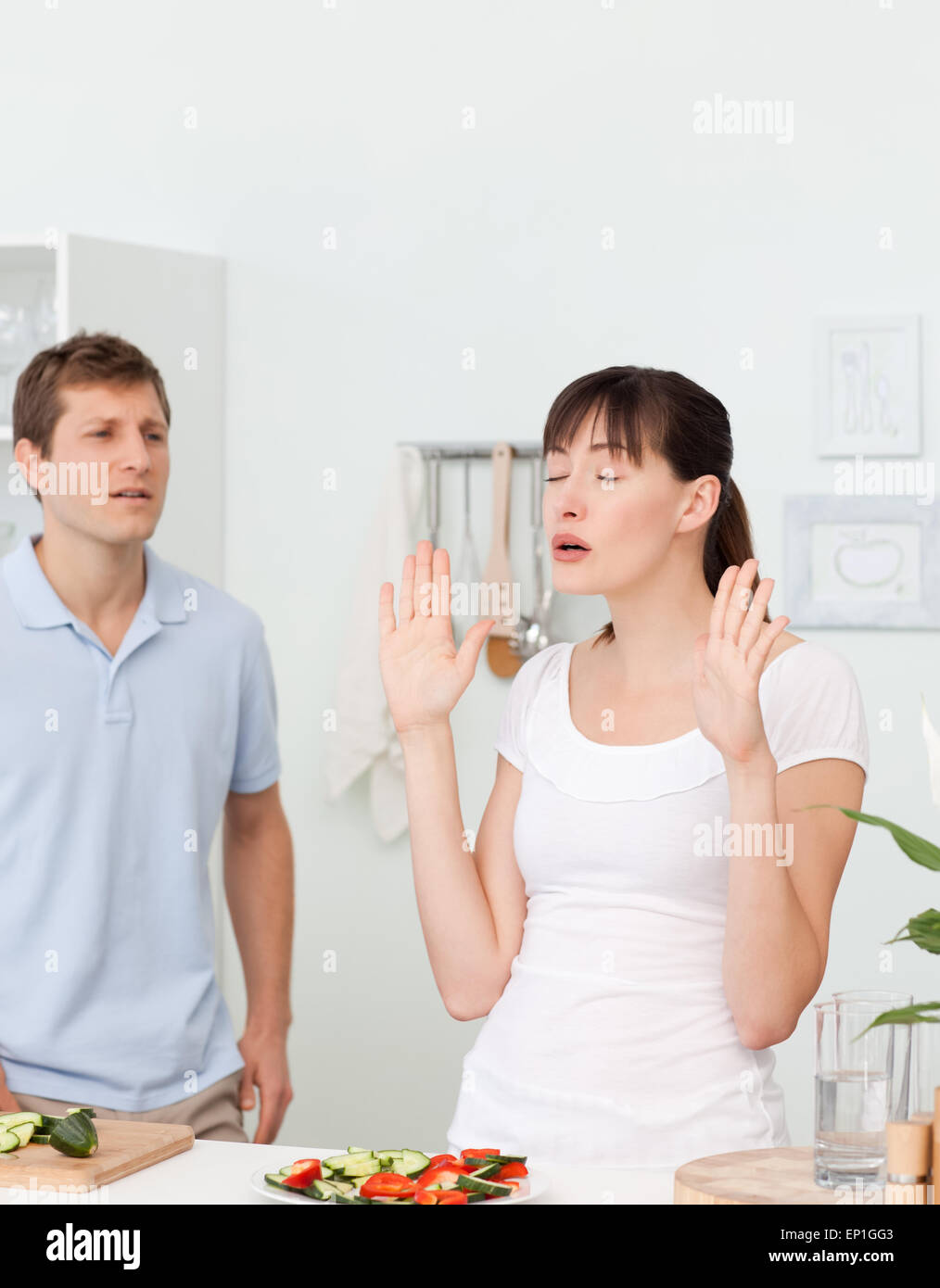 Young lovers having dispute in the kitchen Stock Photo - Alamy