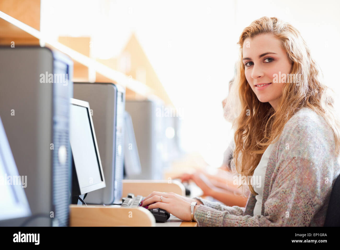 Student posing with a computer Stock Photo - Alamy