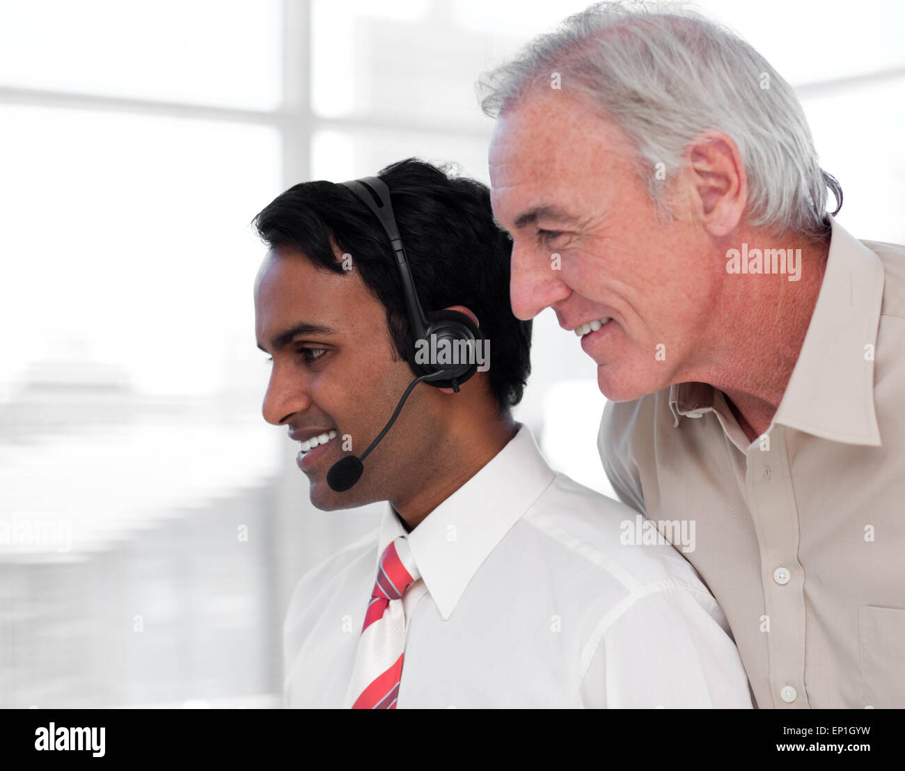 Senior businessman checking work Stock Photo - Alamy