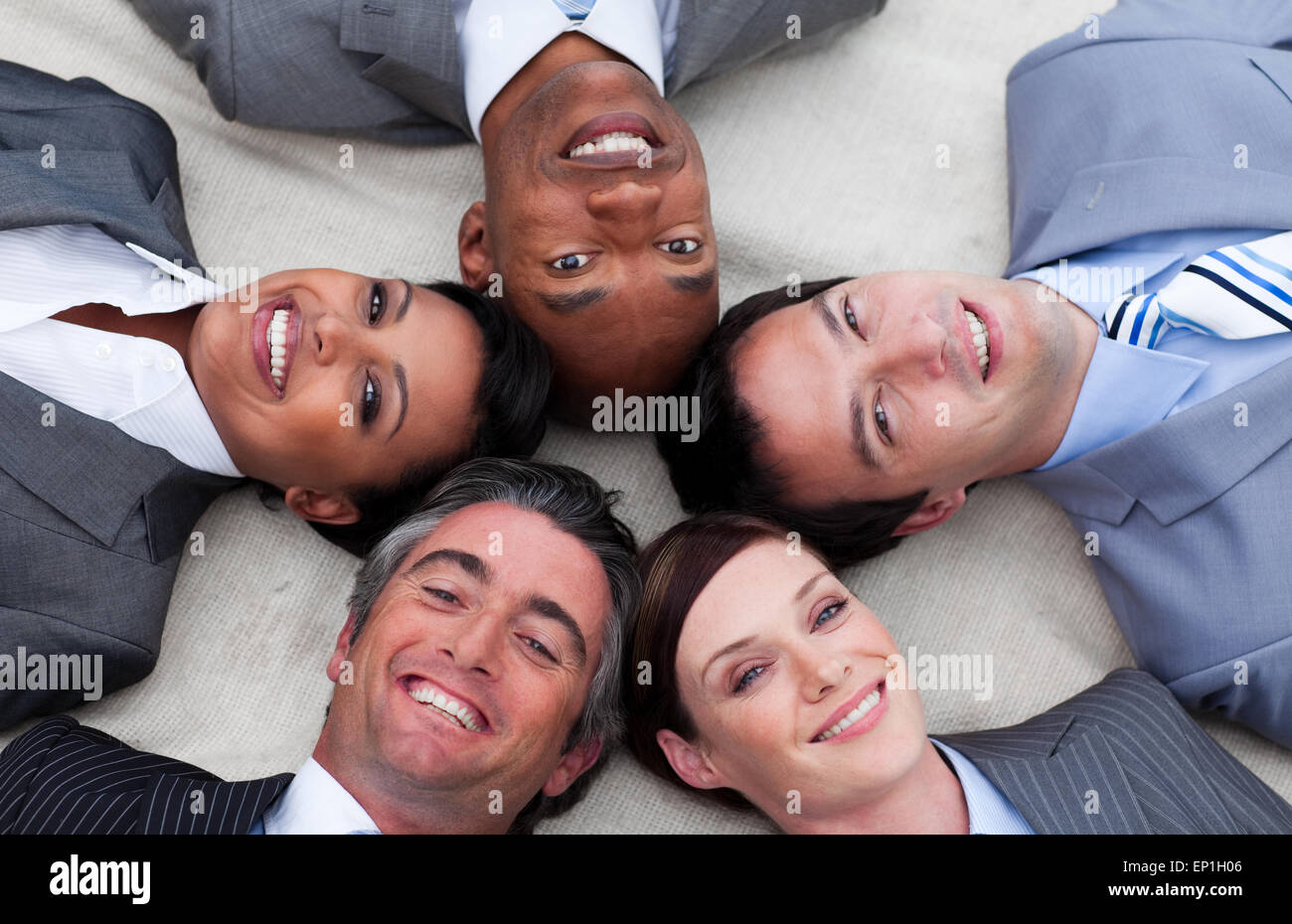 Five people lying on floor hi-res stock photography and images - Alamy