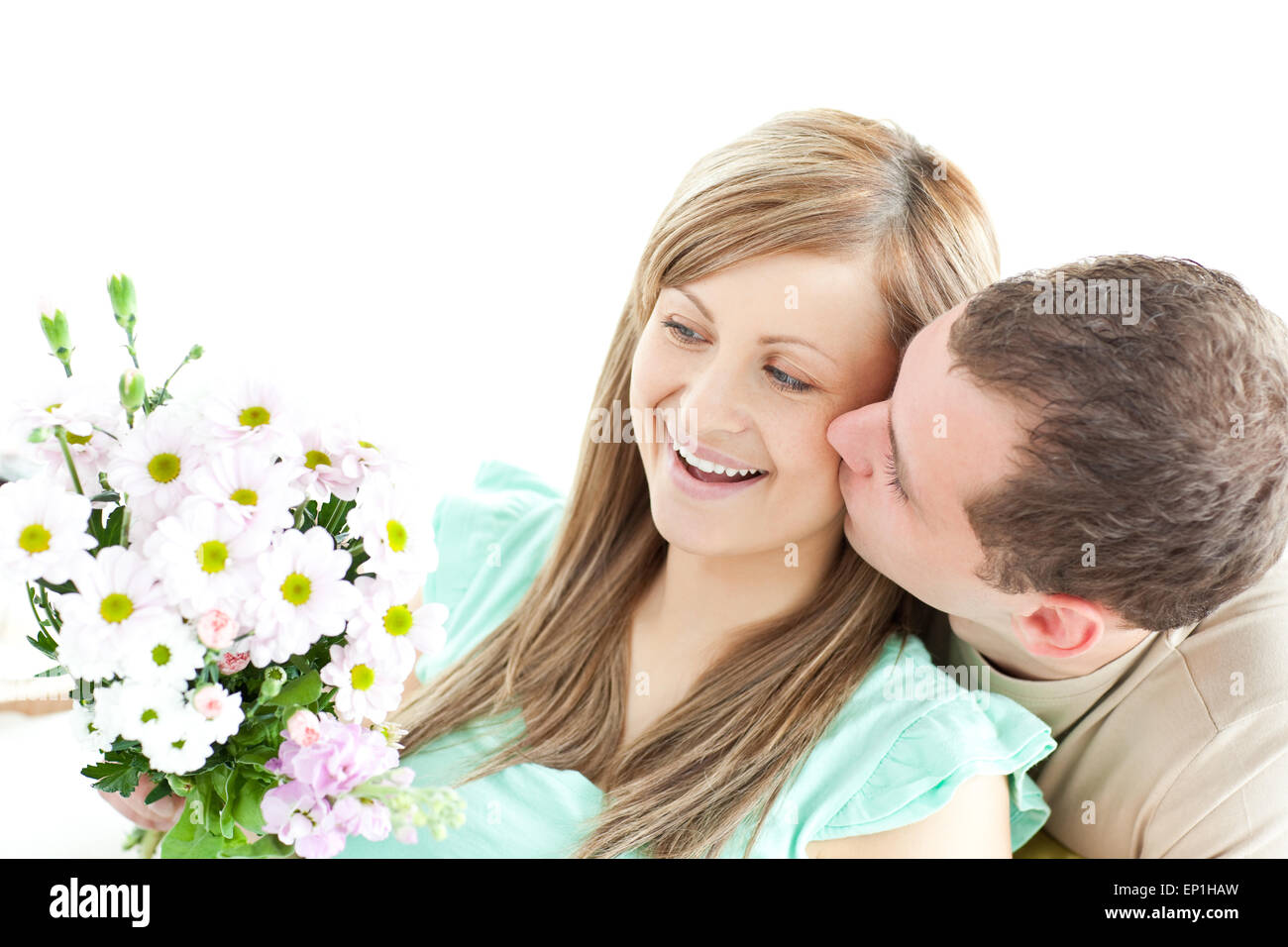 Enamored man giving a bouquet to his girlfriend Stock Photo - Alamy