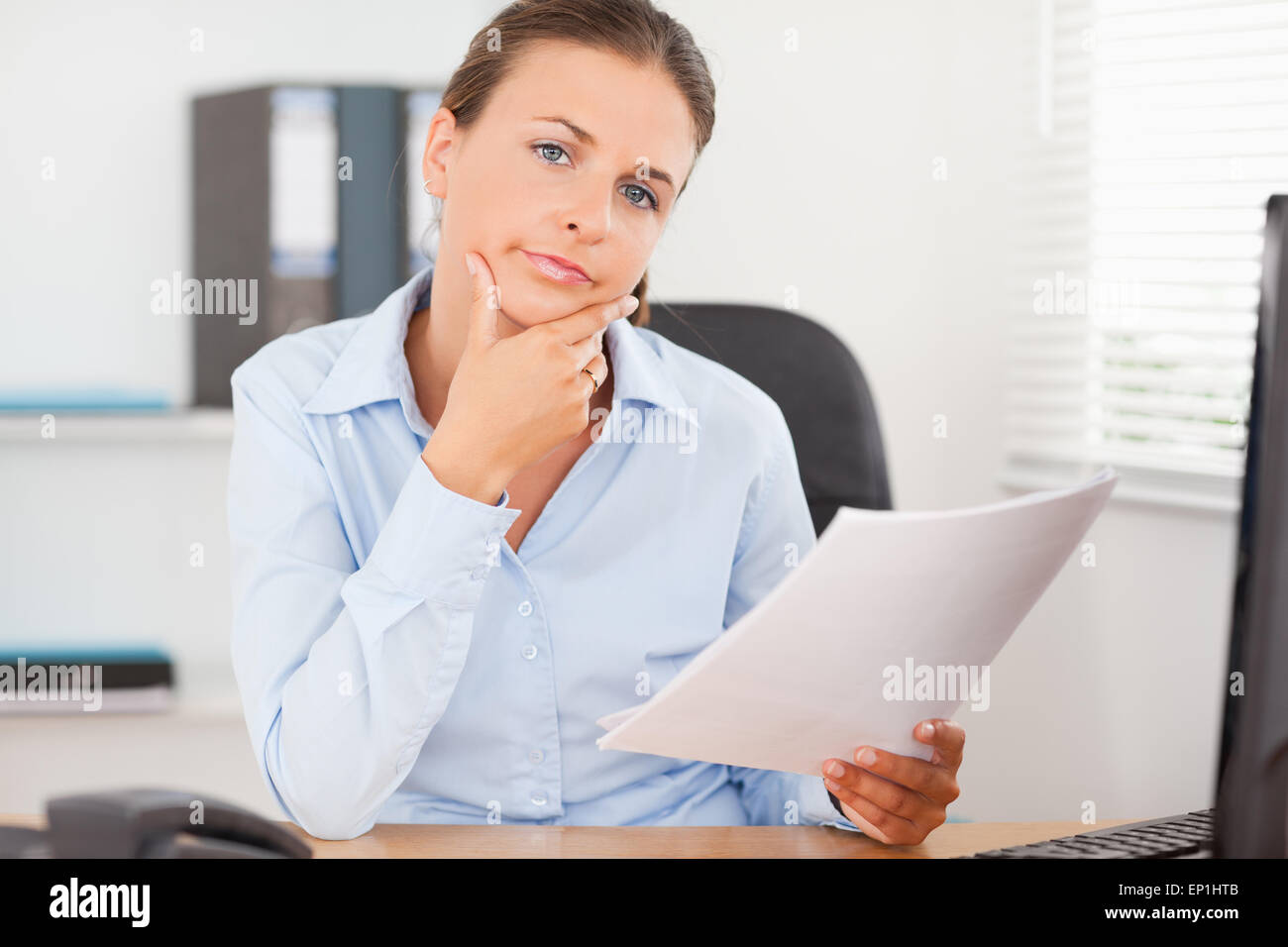 Businesswoman thinking about a strategy Stock Photo - Alamy