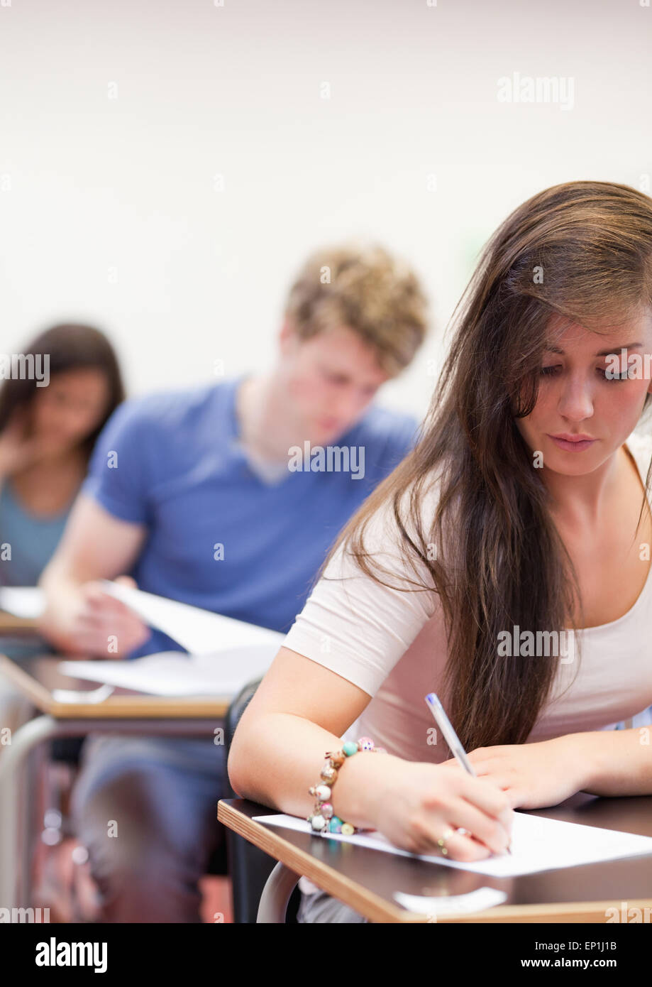 Portrait of students having a test Stock Photo - Alamy