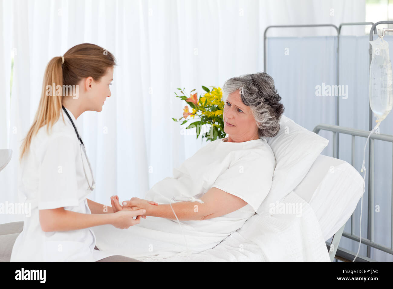Hand putting pressure on arm hi-res stock photography and images - Alamy