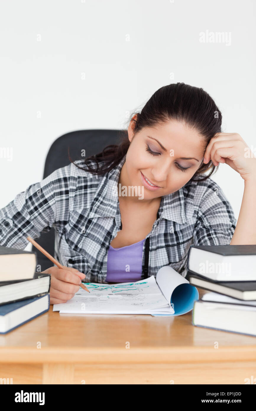 Beautiful young student learning Stock Photo - Alamy