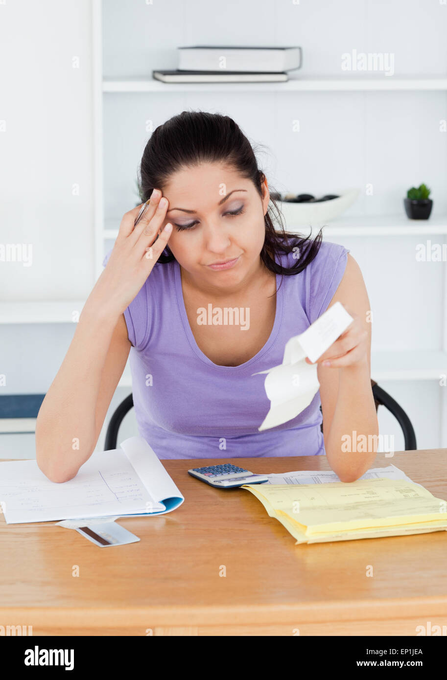 Frustrated young female accounting Stock Photo - Alamy