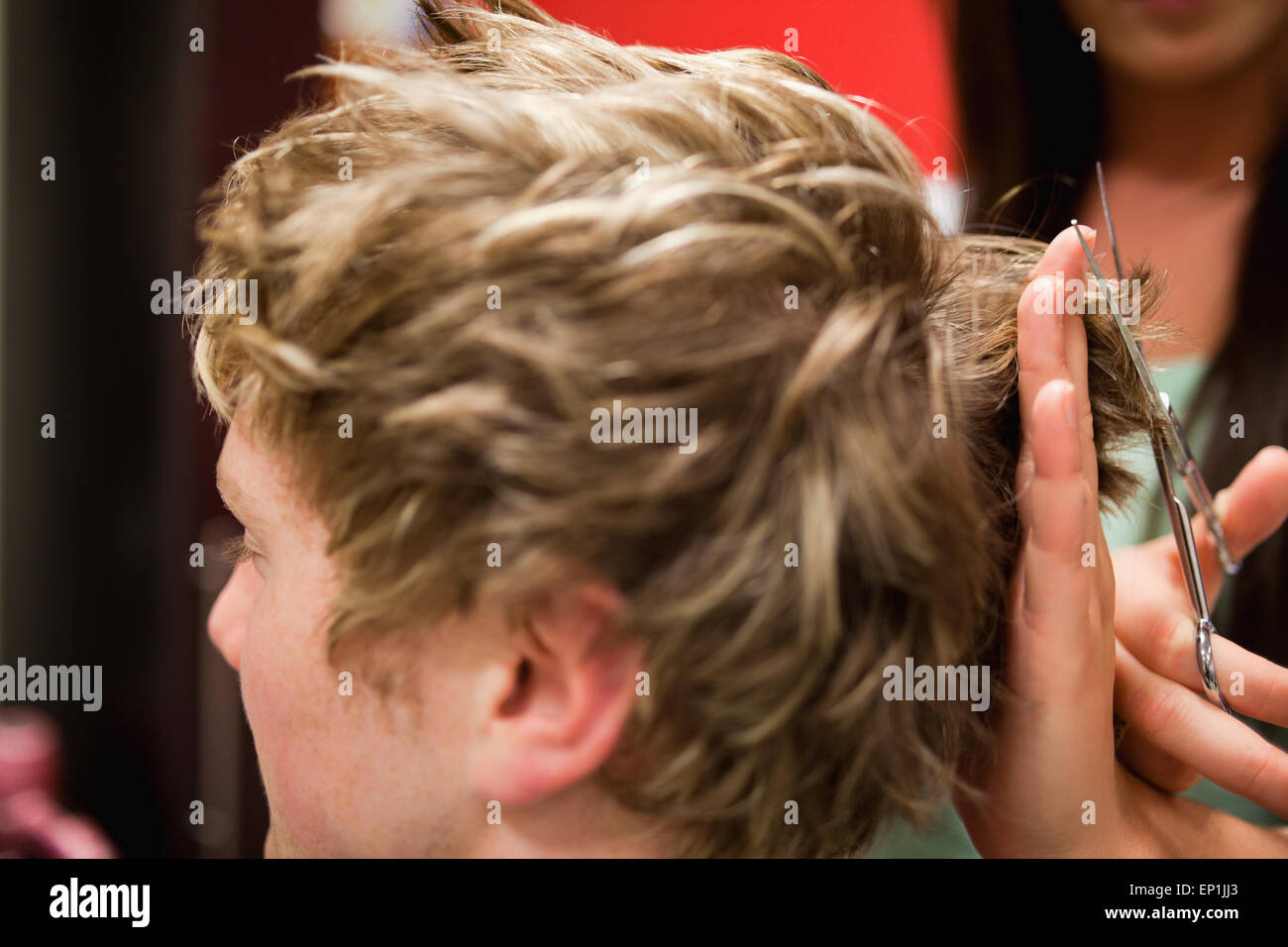 Student having a haircut Stock Photo - Alamy