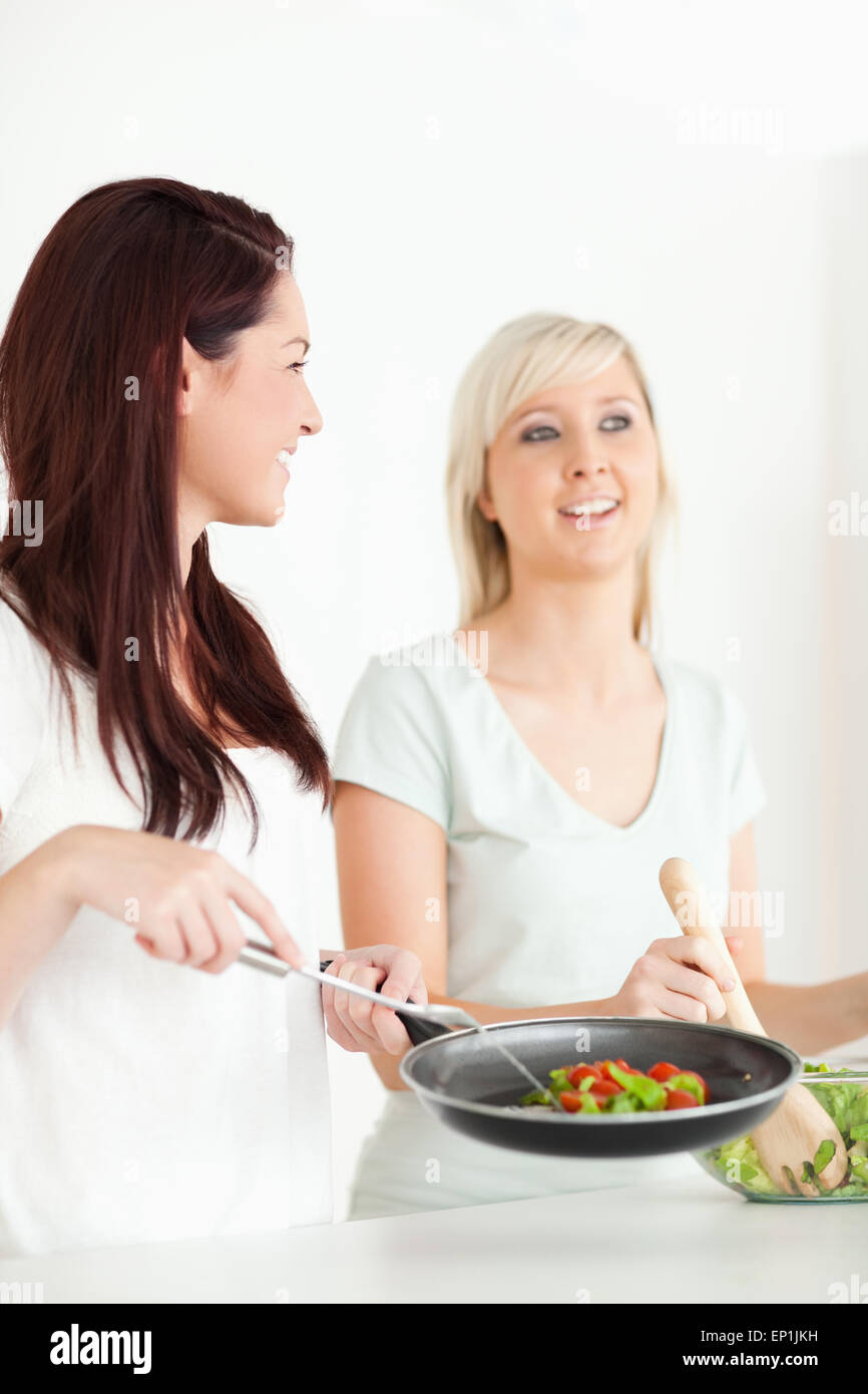 Two women kitchen serious hi-res stock photography and images - Alamy