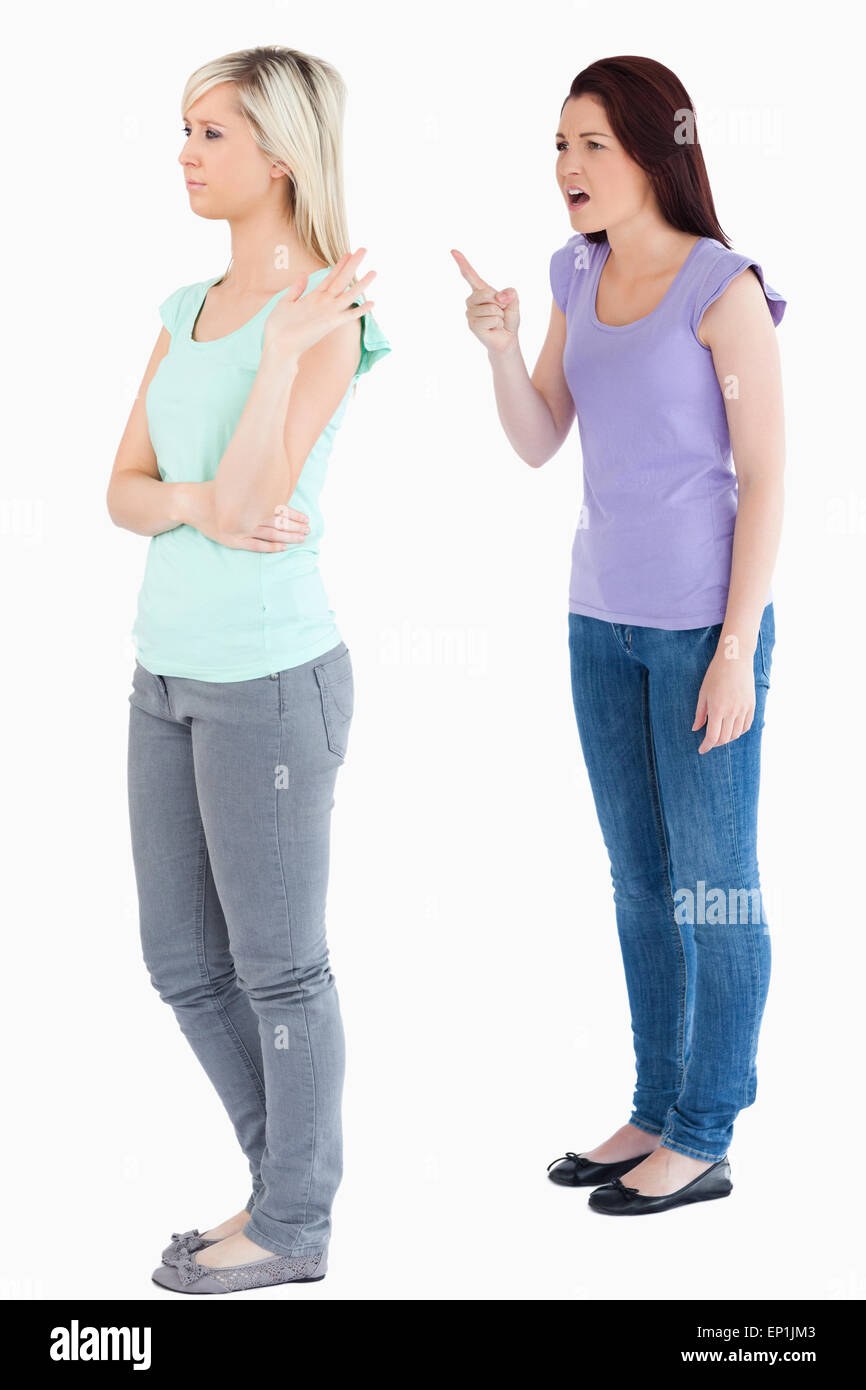 Woman ignoring angry lady Stock Photo - Alamy