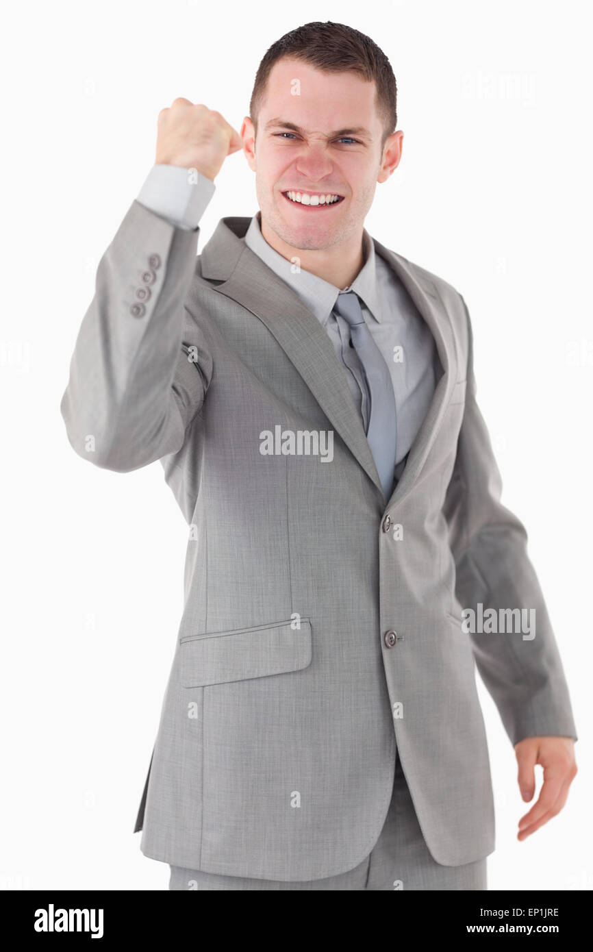 Portrait of a businessman with his fist up Stock Photo - Alamy